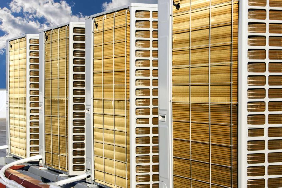 gold AC units on the building – Conditioned Air